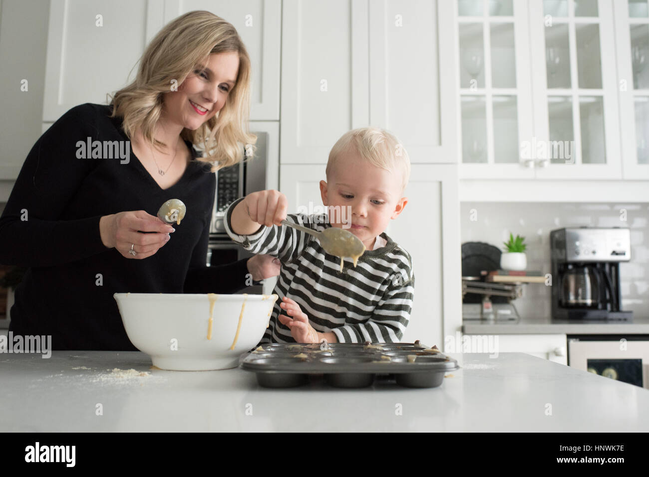 Boy spooning hi-res stock photography and images - Alamy