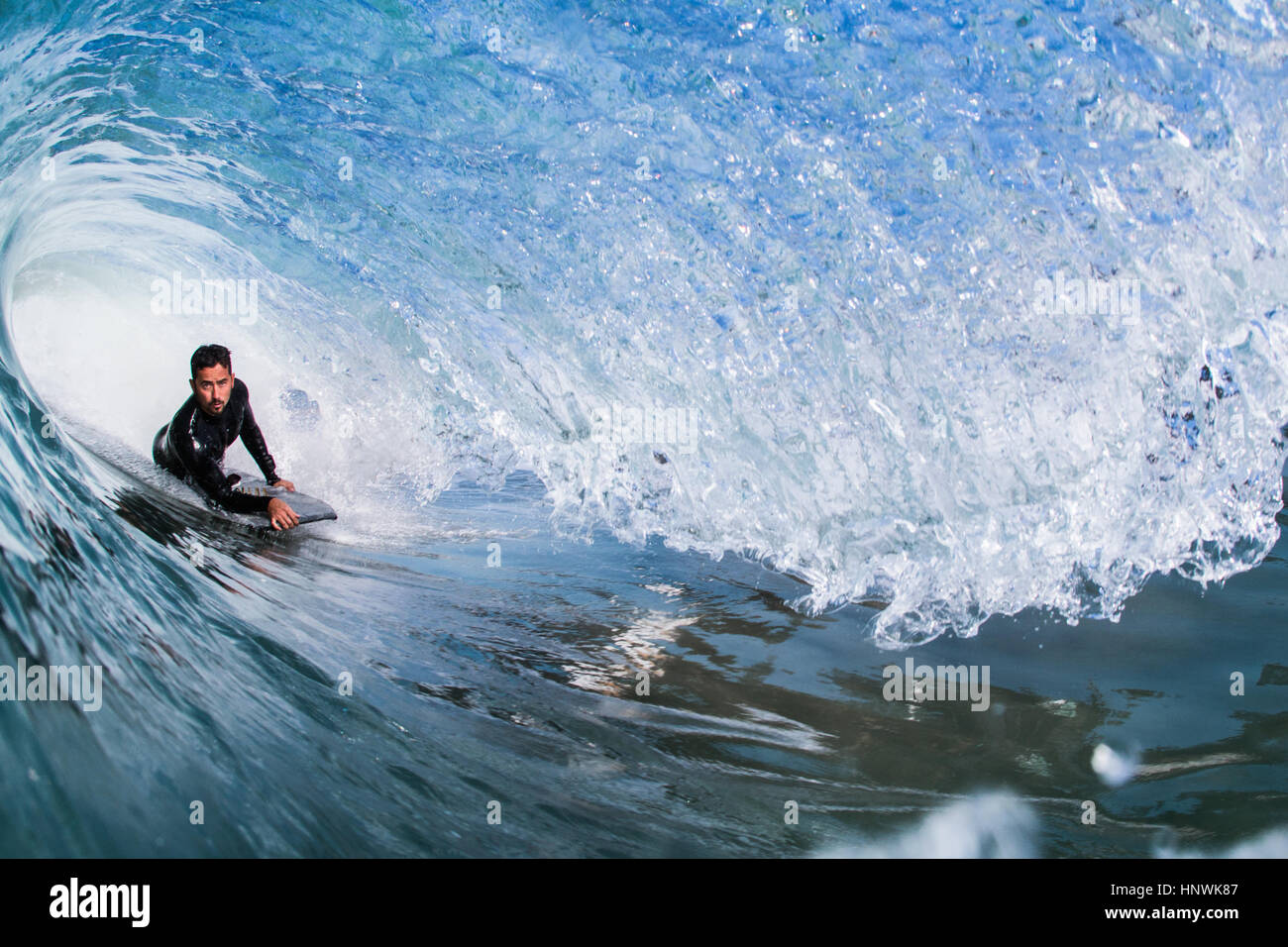 Man surfing in sea, Encinitas, California, USA Stock Photo - Alamy