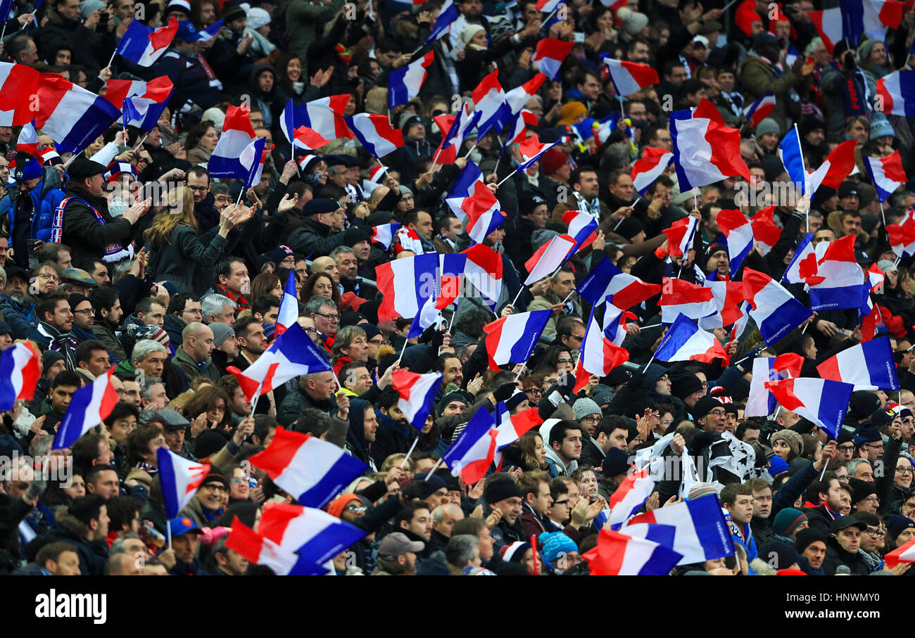France fans wave flags in the stands Stock Photo - Alamy