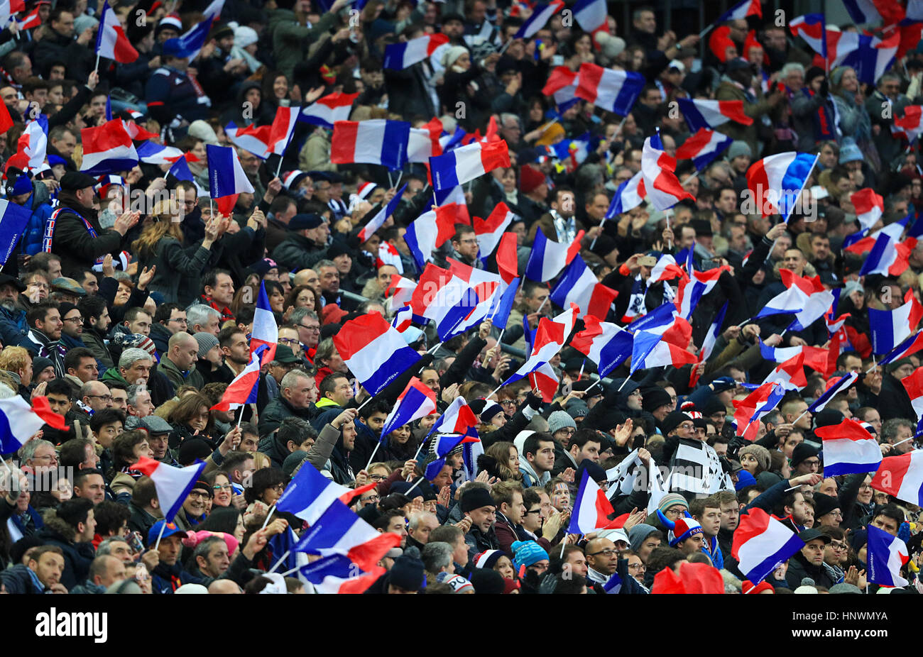 France fans wave flags in the stands Stock Photo - Alamy