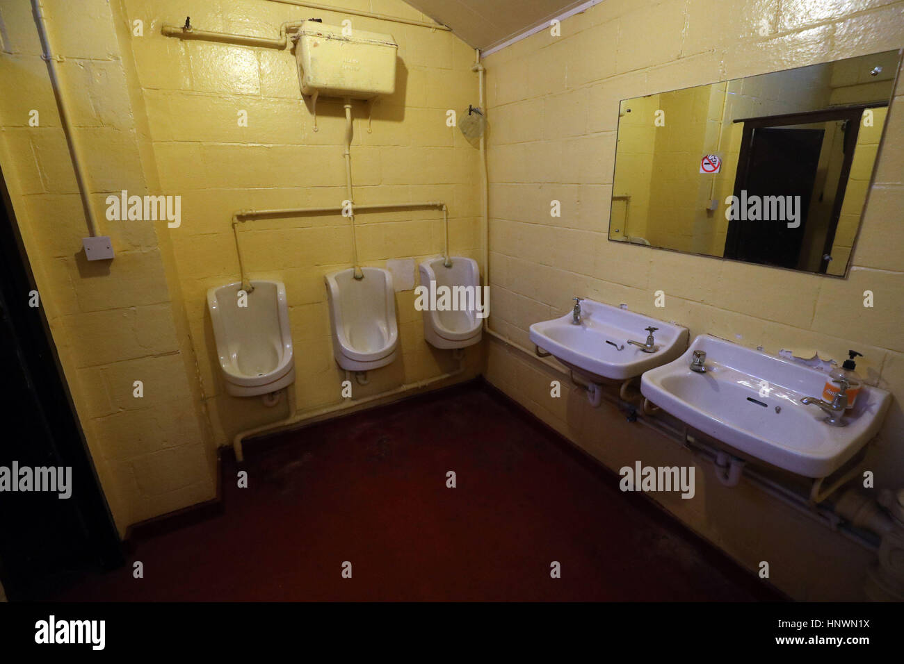 A general view of the away dressing room toilets at Gander Green Lane ...