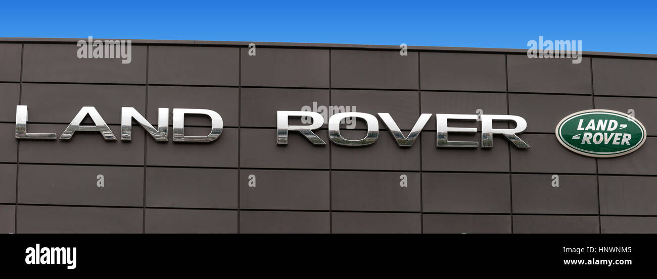 Land Rover sign. Land Rover is a car brand that specialises in four ...