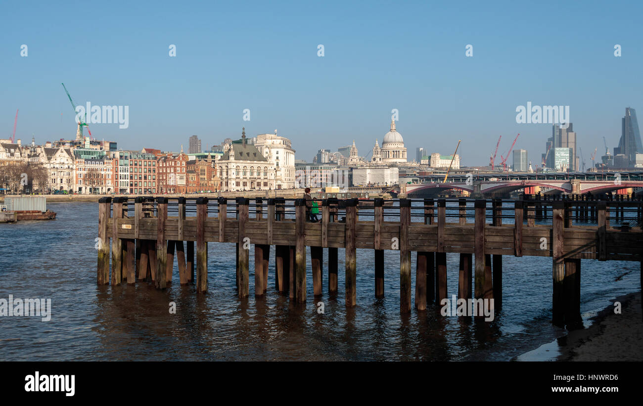 People on a Jetty on the Southbank of the Thames Stock Photo - Alamy