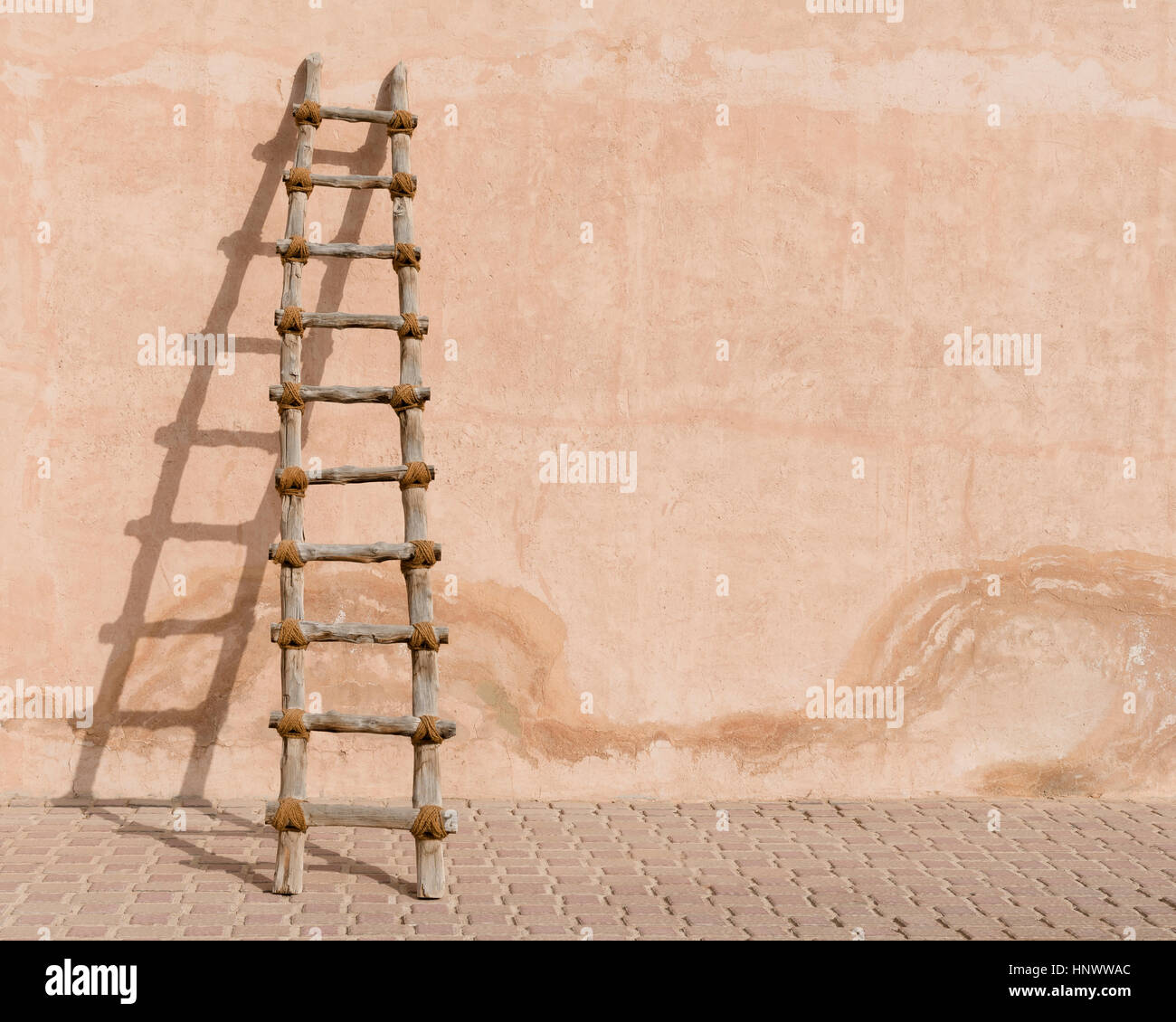 Ladder against wall hi-res stock photography and images - Alamy