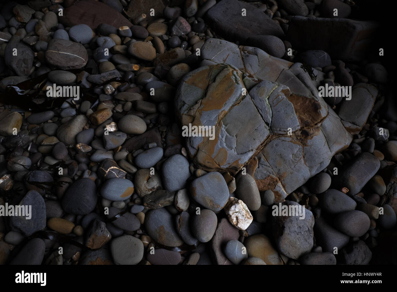 Rocks and sand Stock Photo - Alamy