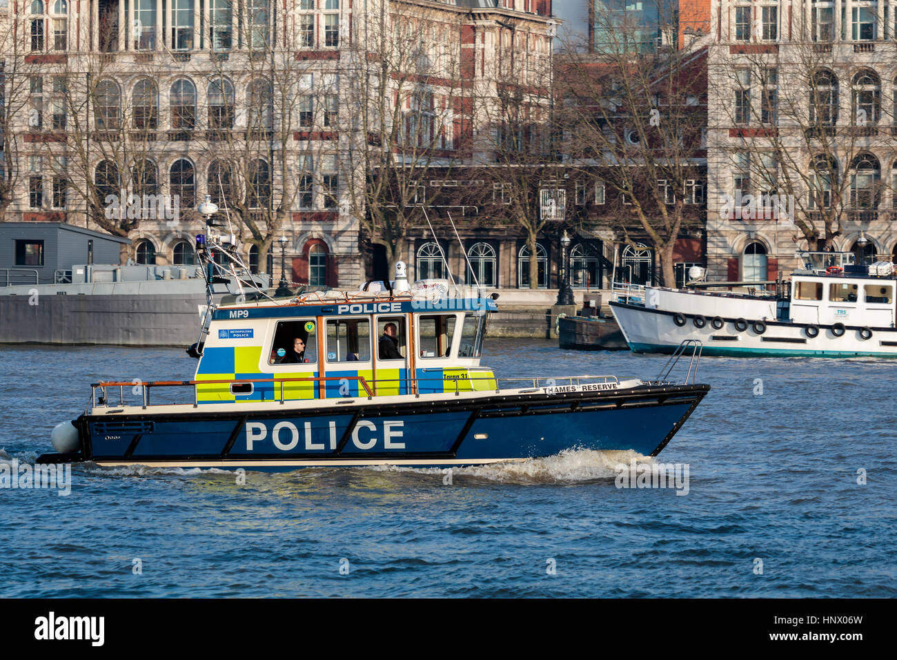 Police Launch Cruising along the River Thames Stock Photo - Alamy