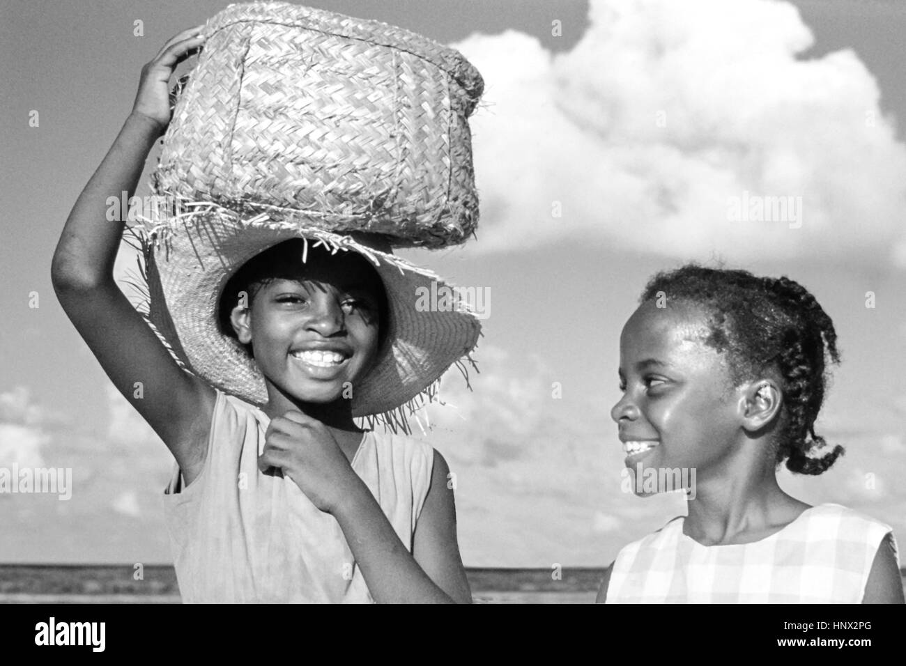 Carrying salt on Ragged Island, Bahamas Stock Photo - Alamy
