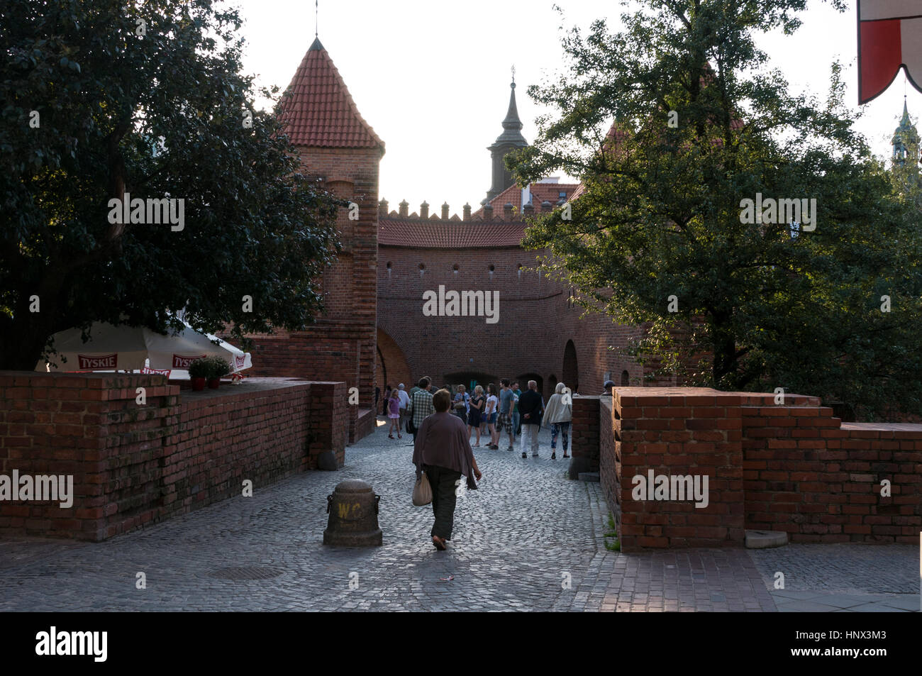 The city fortified medieval wall and the Barbican in Warsaw Old Town ...