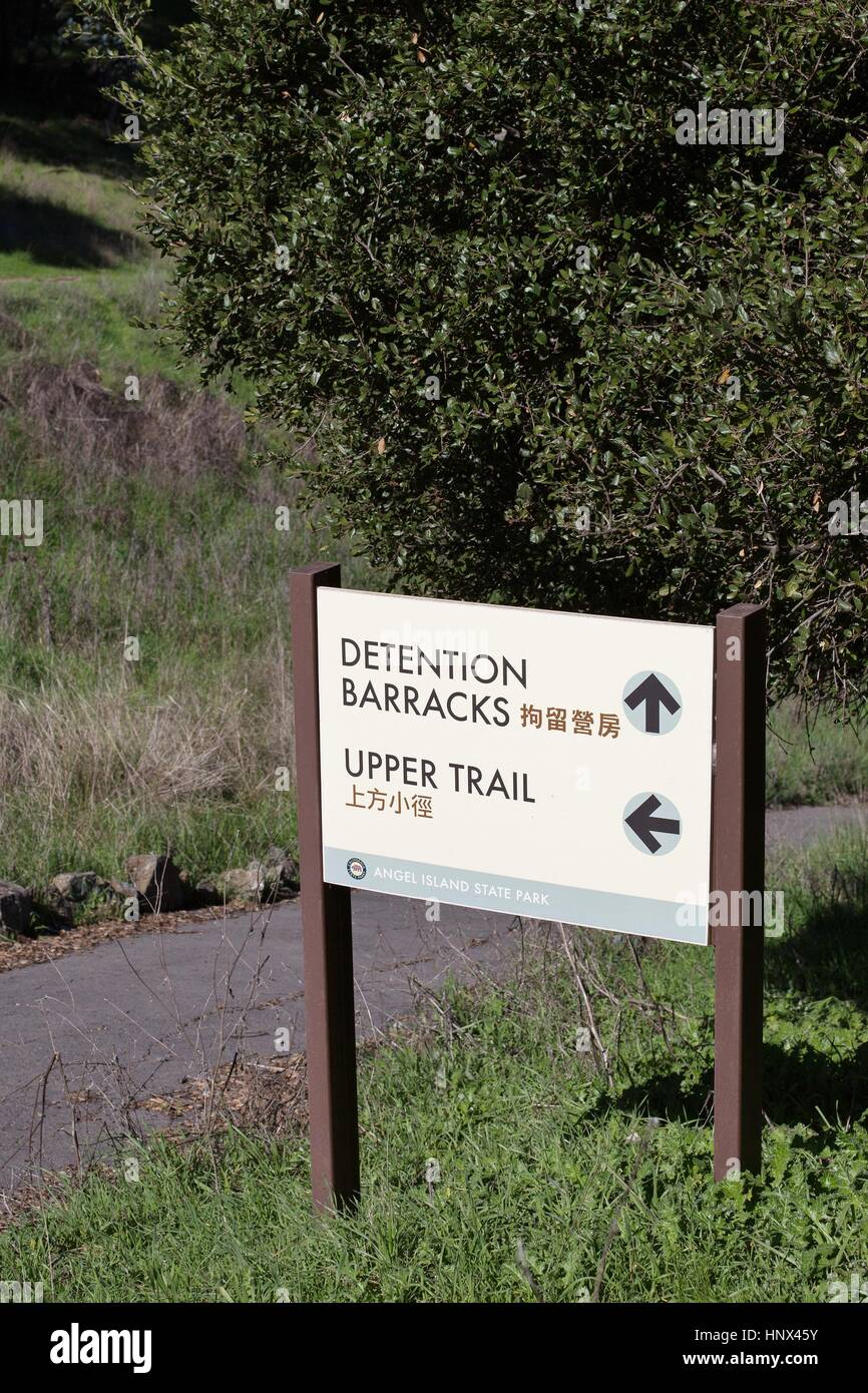 A sign pointing to the detention barracks at the Immigration Station on ...