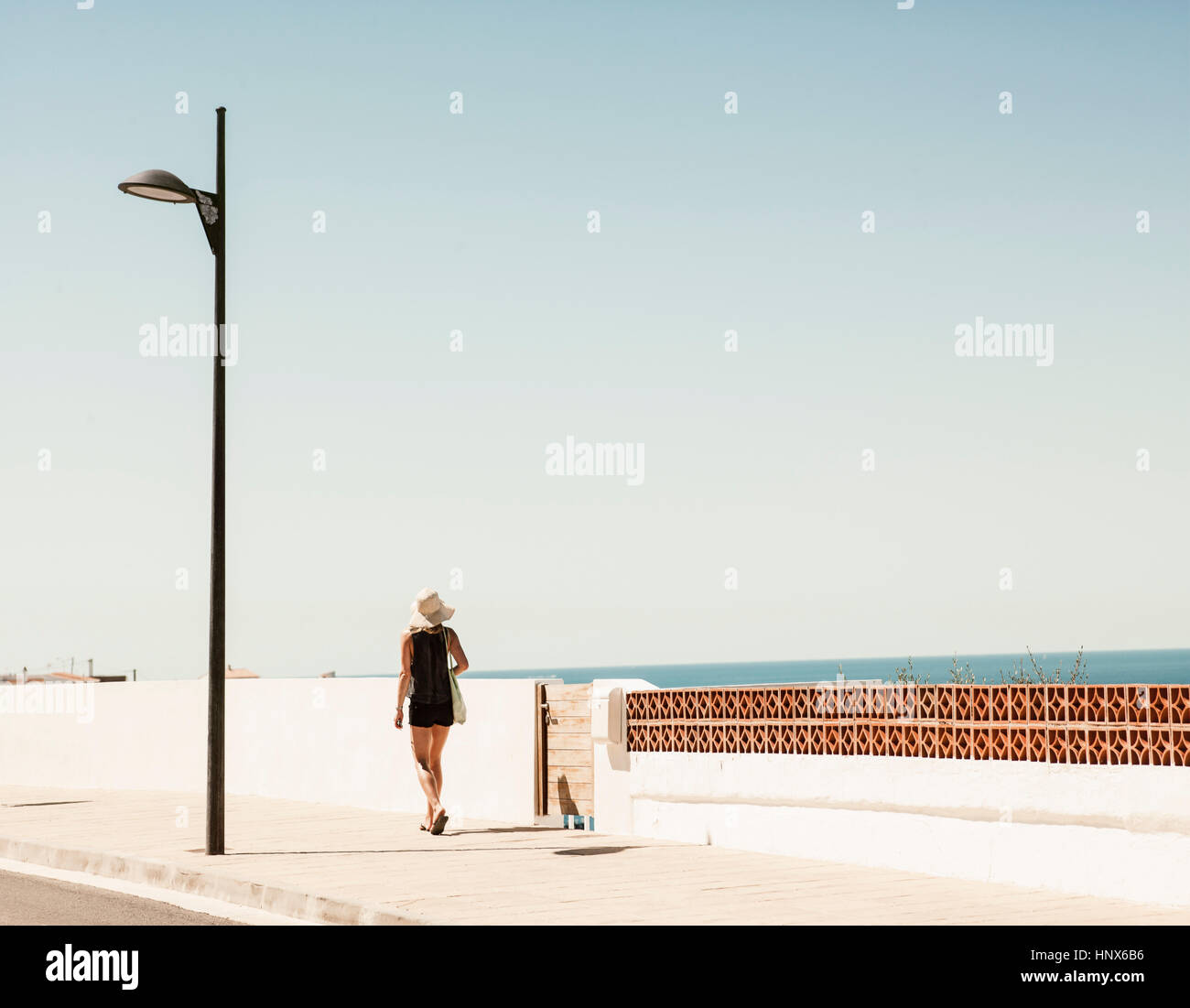 Woman in street rear view hi-res stock photography and images - Alamy