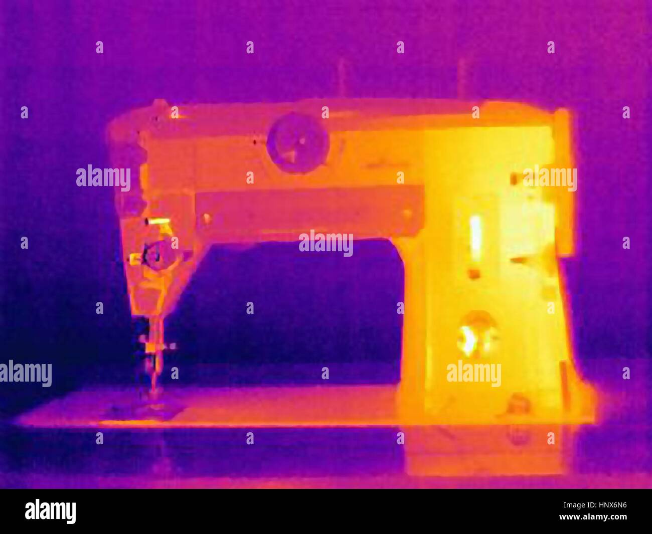 Thermal image of sewing machine Stock Photo - Alamy
