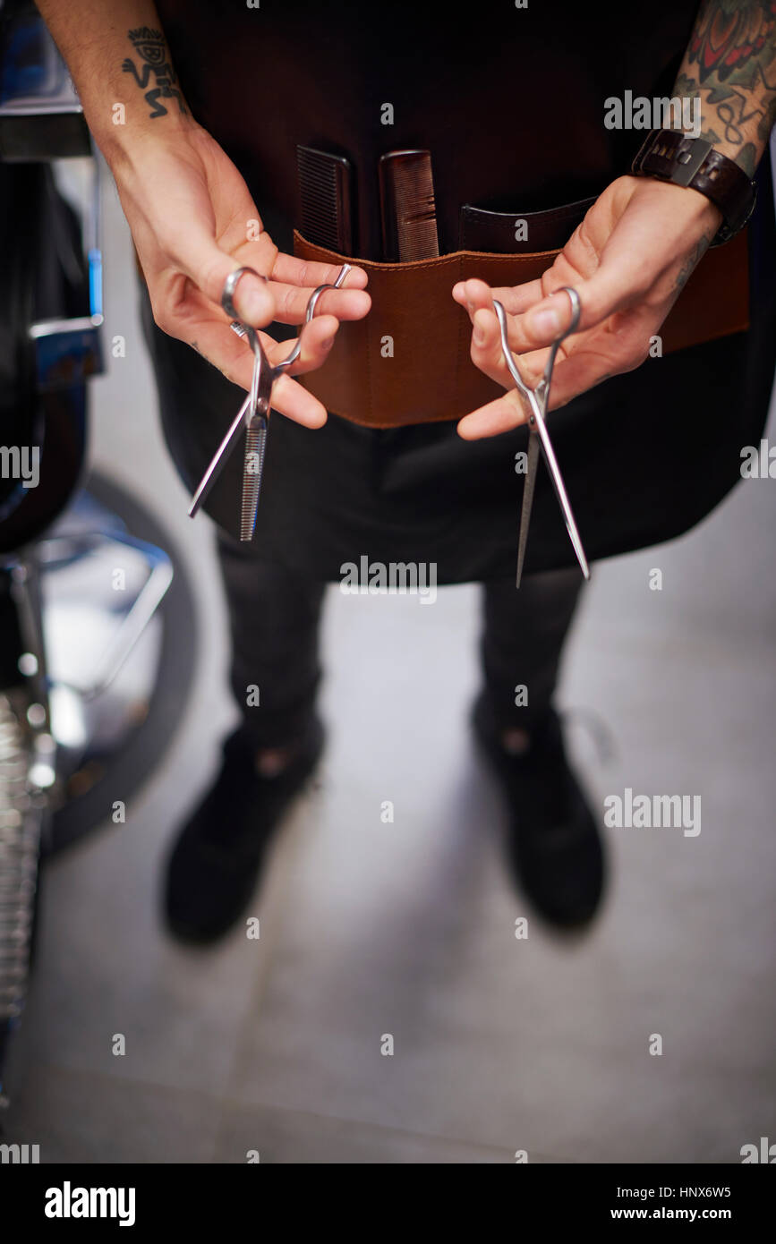 Person holding scissors hi-res stock photography and images - Alamy