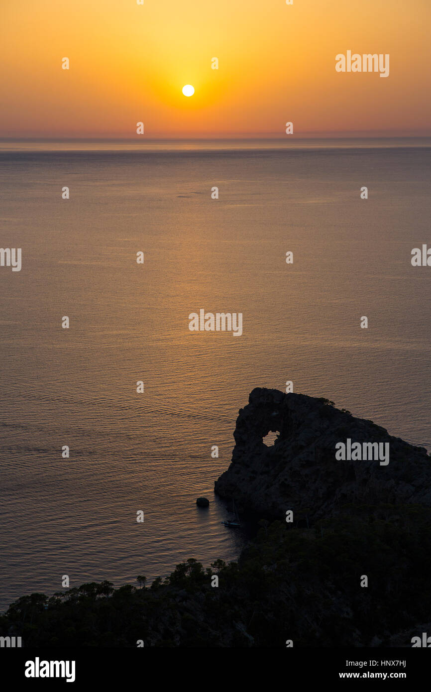 Golden sunset over sea horizon, Sa Foradada, Majorca, Spain Stock Photo ...
