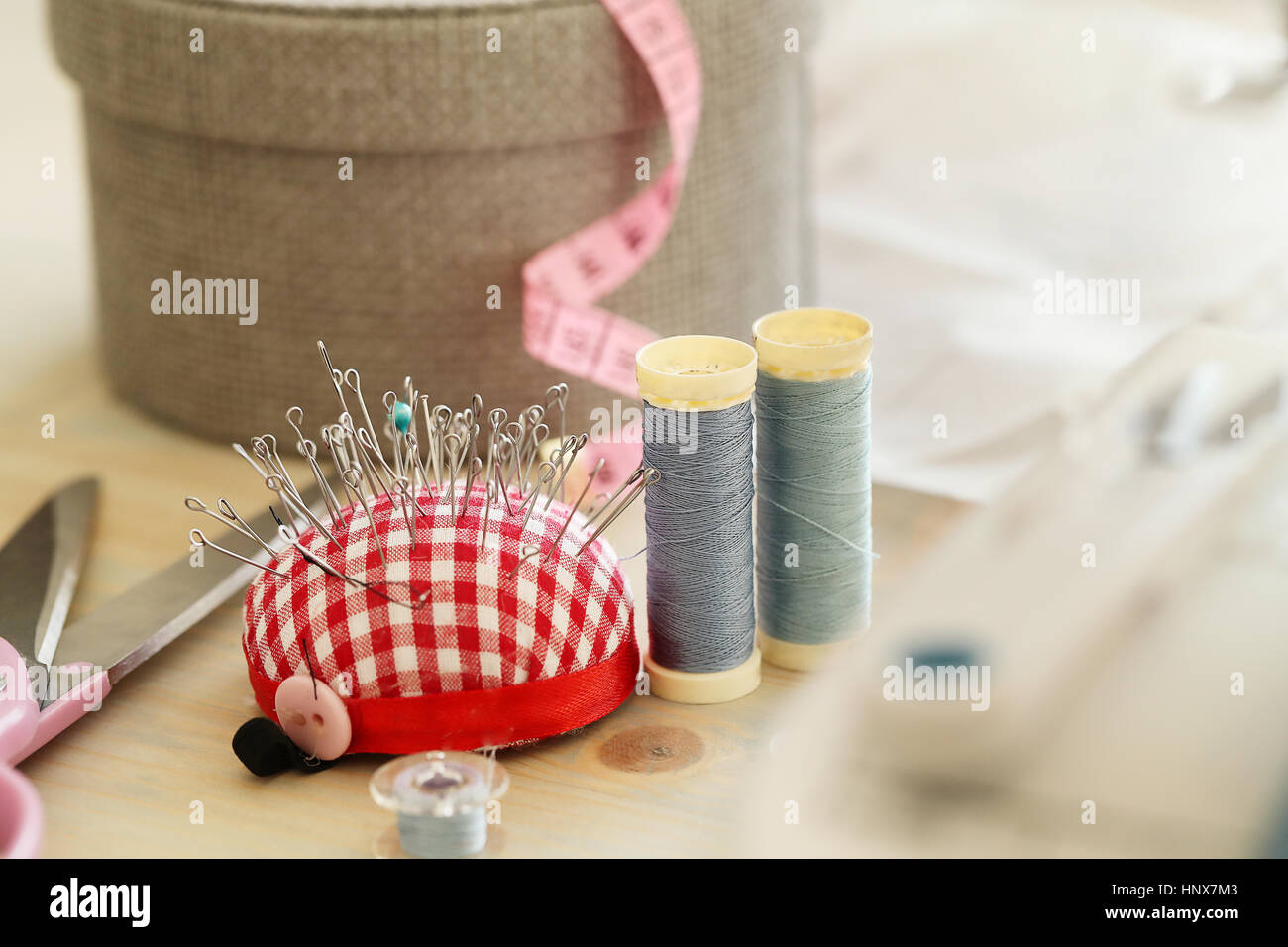 Sewing tools on the table Stock Photo - Alamy