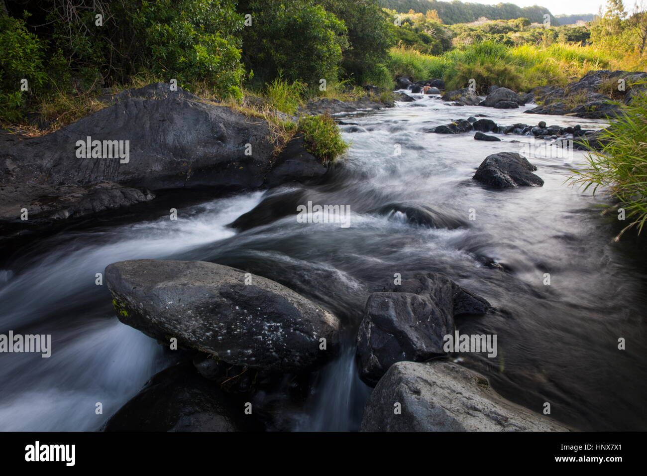 River flowing over rocks, Reunion Island Stock Photo - Alamy