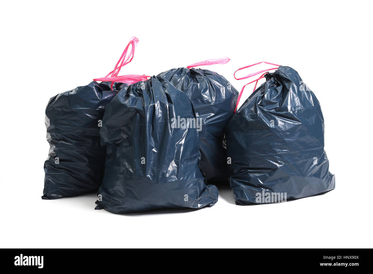 Pollution. Trash bags on a white background Stock Photo - Alamy