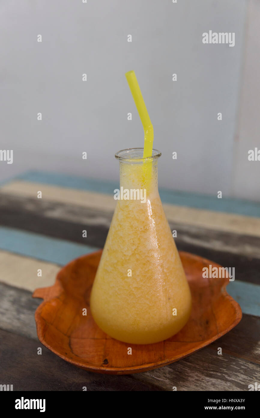 mango juice smoothie drink in flask glass Stock Photo - Alamy