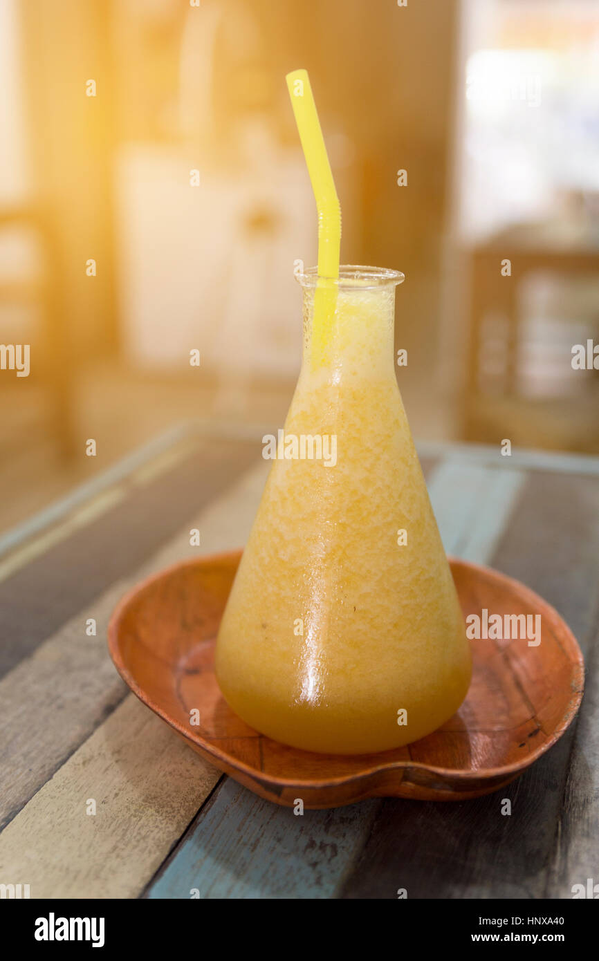 mango juice smoothie drink in flask glass Stock Photo - Alamy