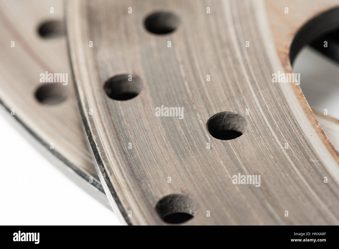 closeup old motorcycle disc break on white background Stock Photo - Alamy