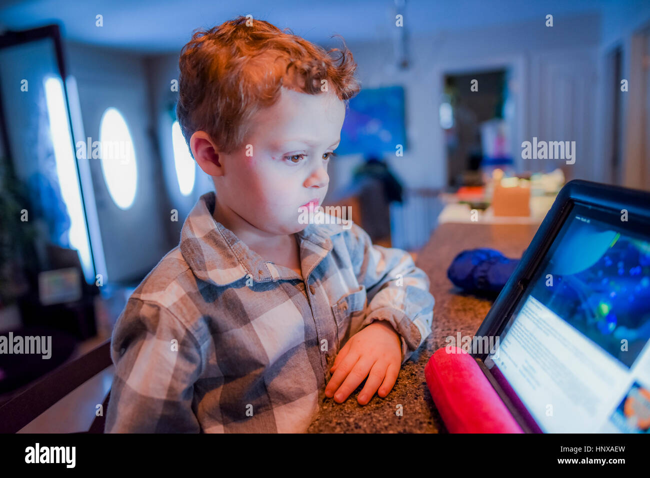 Watching video hi-res stock photography and images - Alamy
