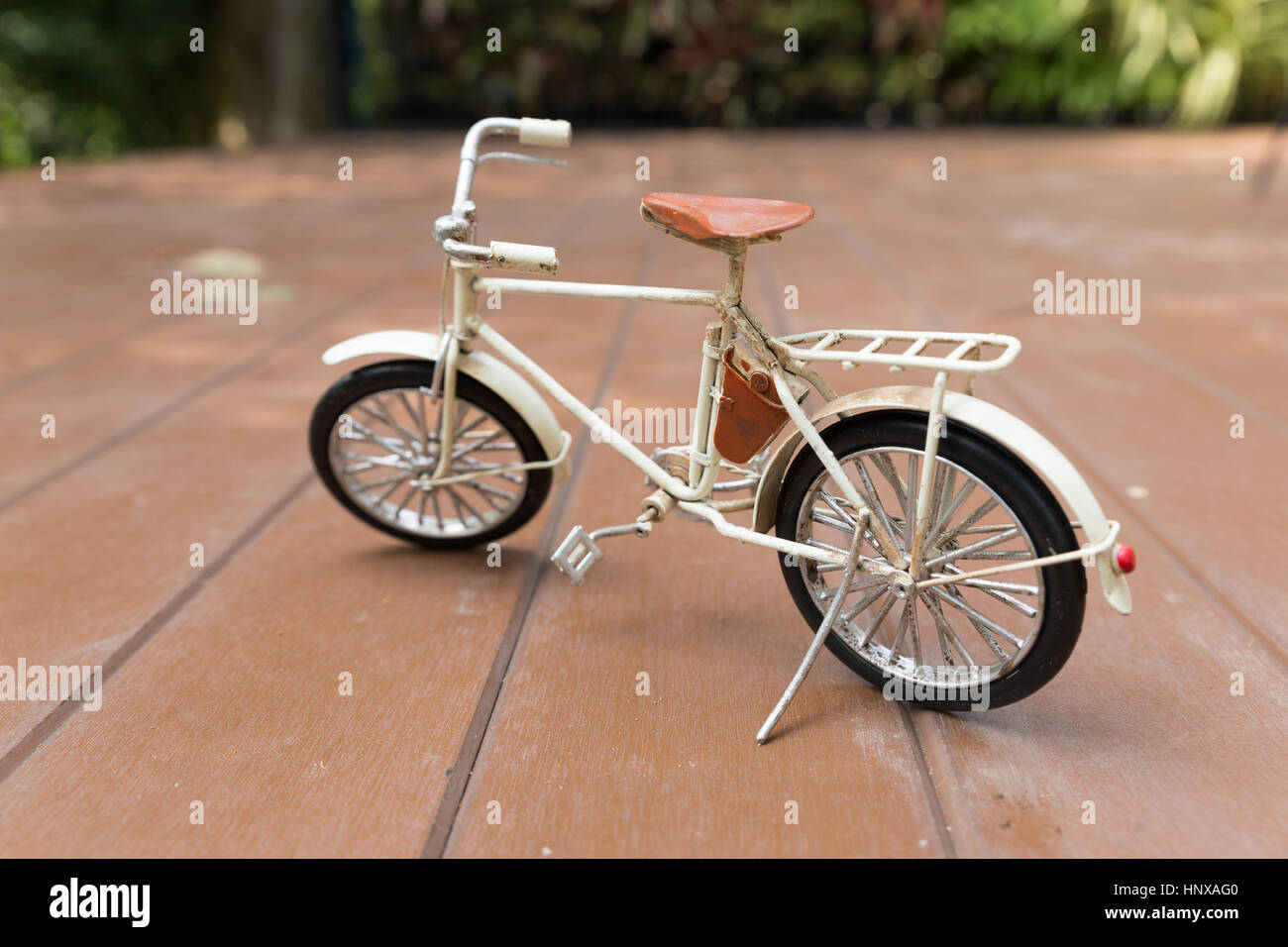 bicycle model on wood floor - travel and journey concept Stock Photo ...
