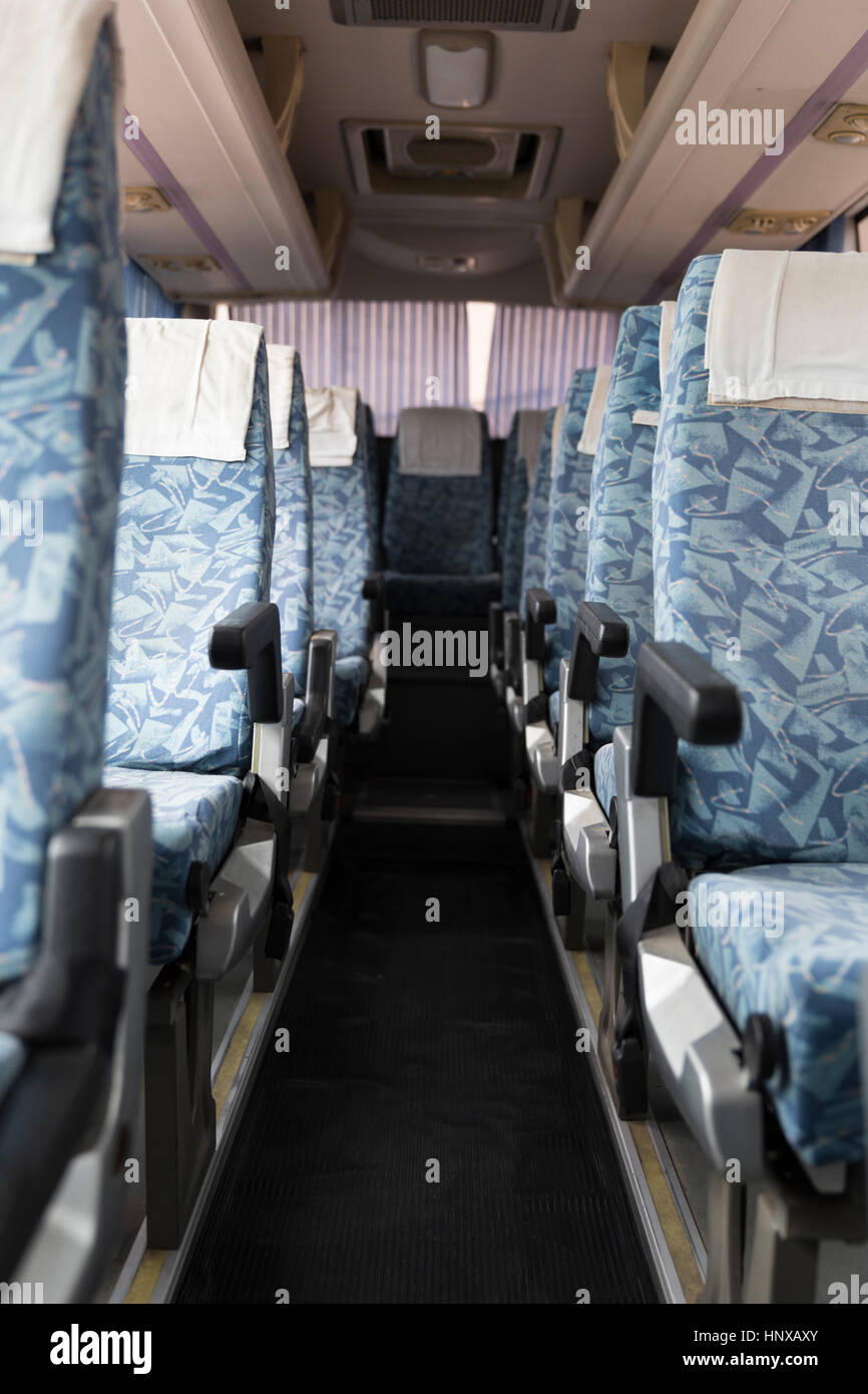 blue fabric vehicle seat in interior mini bus Stock Photo - Alamy