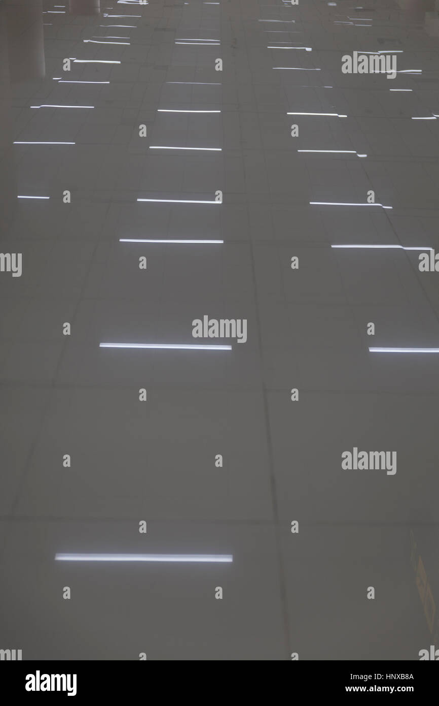 abstract background of reflection of fluorescent light bulb on tile ...