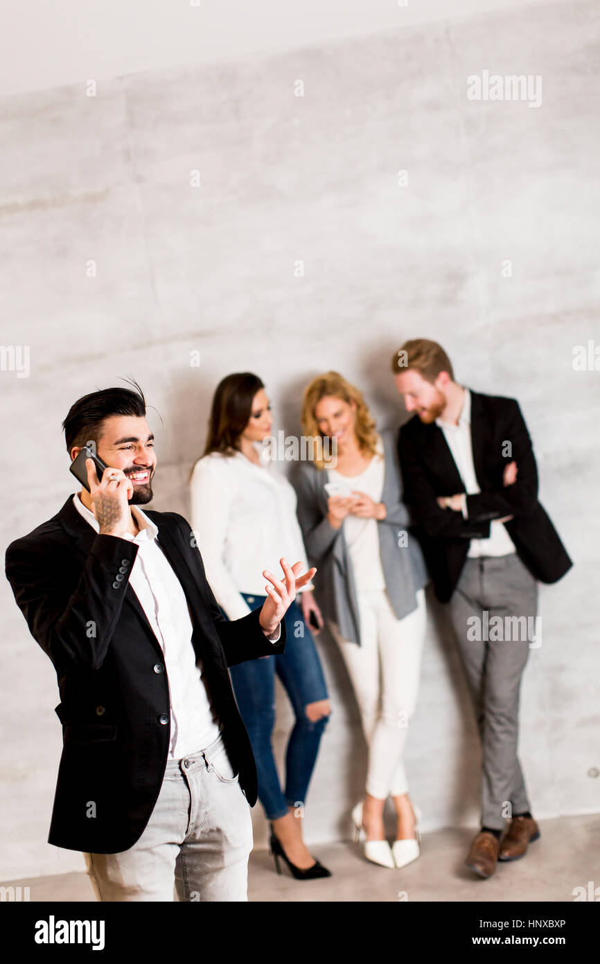 Group of hands holding cell phones hi-res stock photography and images ...