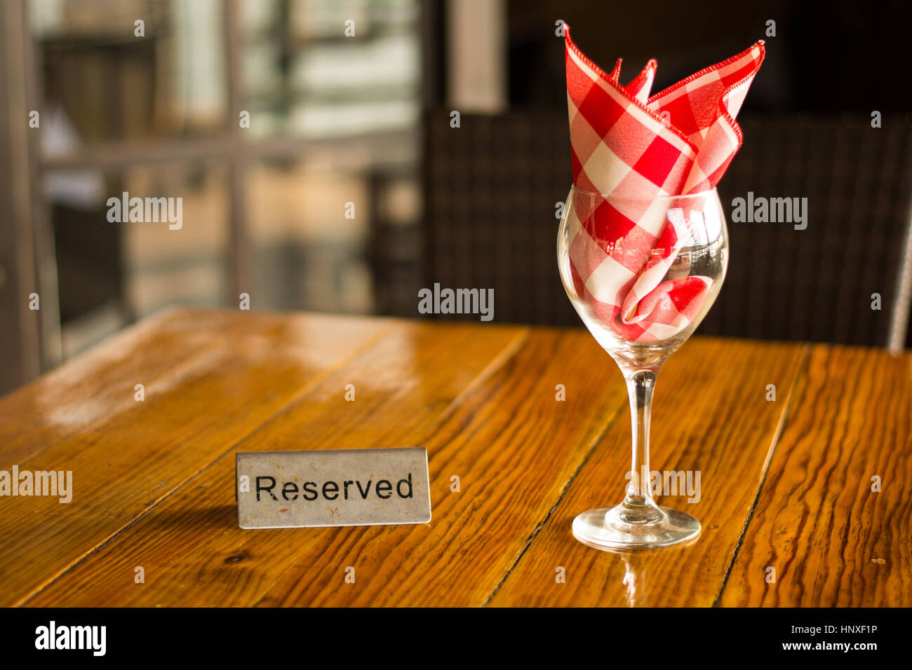 Reserved Sign With Wine Glass On Wood Table Stock Photo - Alamy