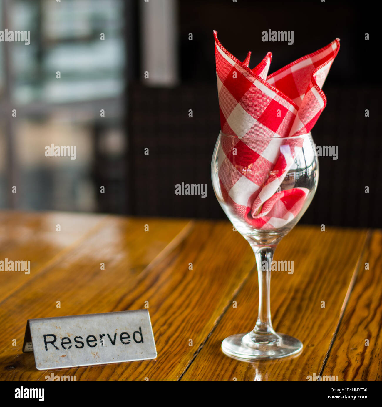 Reserved Sign With Wine Glass On Wood Table Stock Photo - Alamy