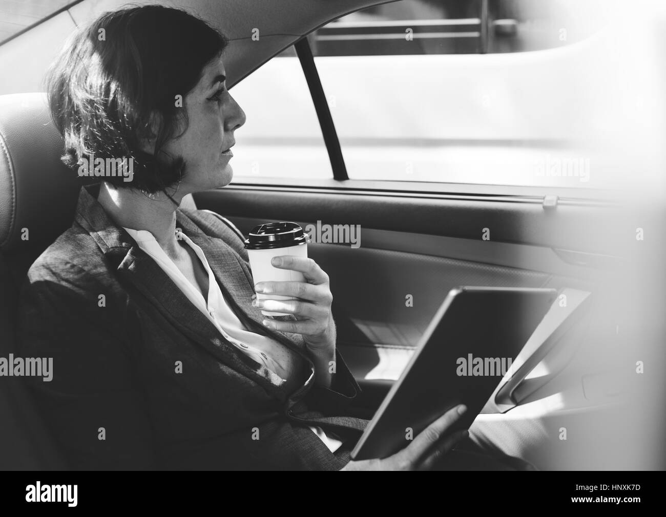 Using digital tablet Black and White Stock Photos & Images - Alamy