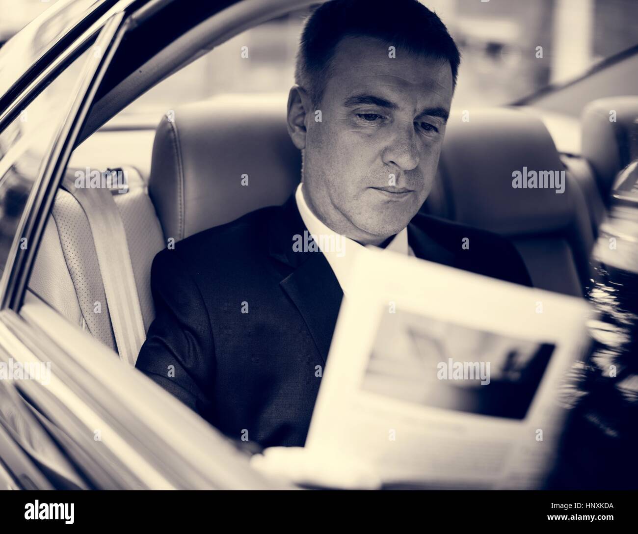 Businessman Working Busy Car Inside Stock Photo - Alamy