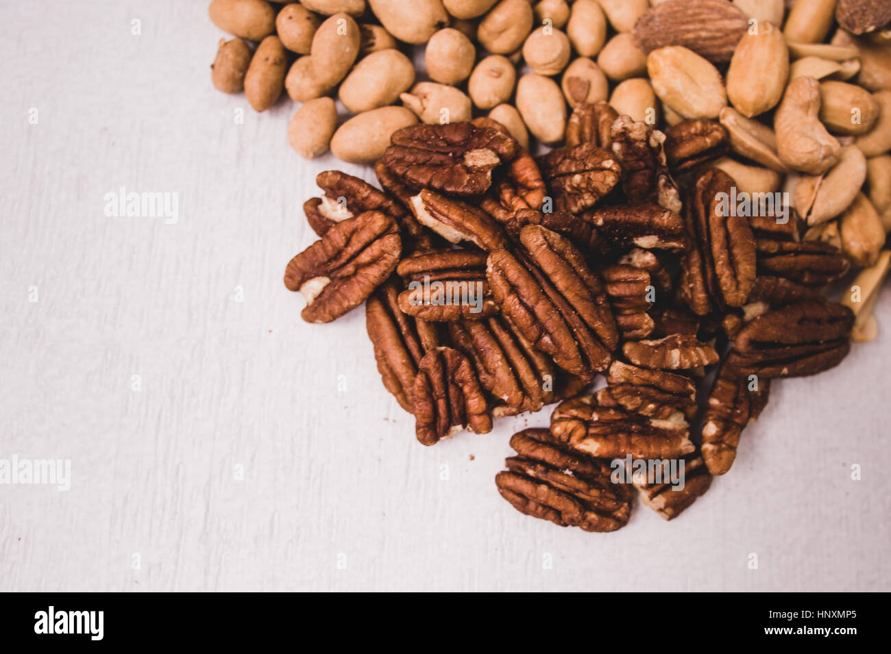 Nuts mixed, for backgrounds or textures Stock Photo - Alamy