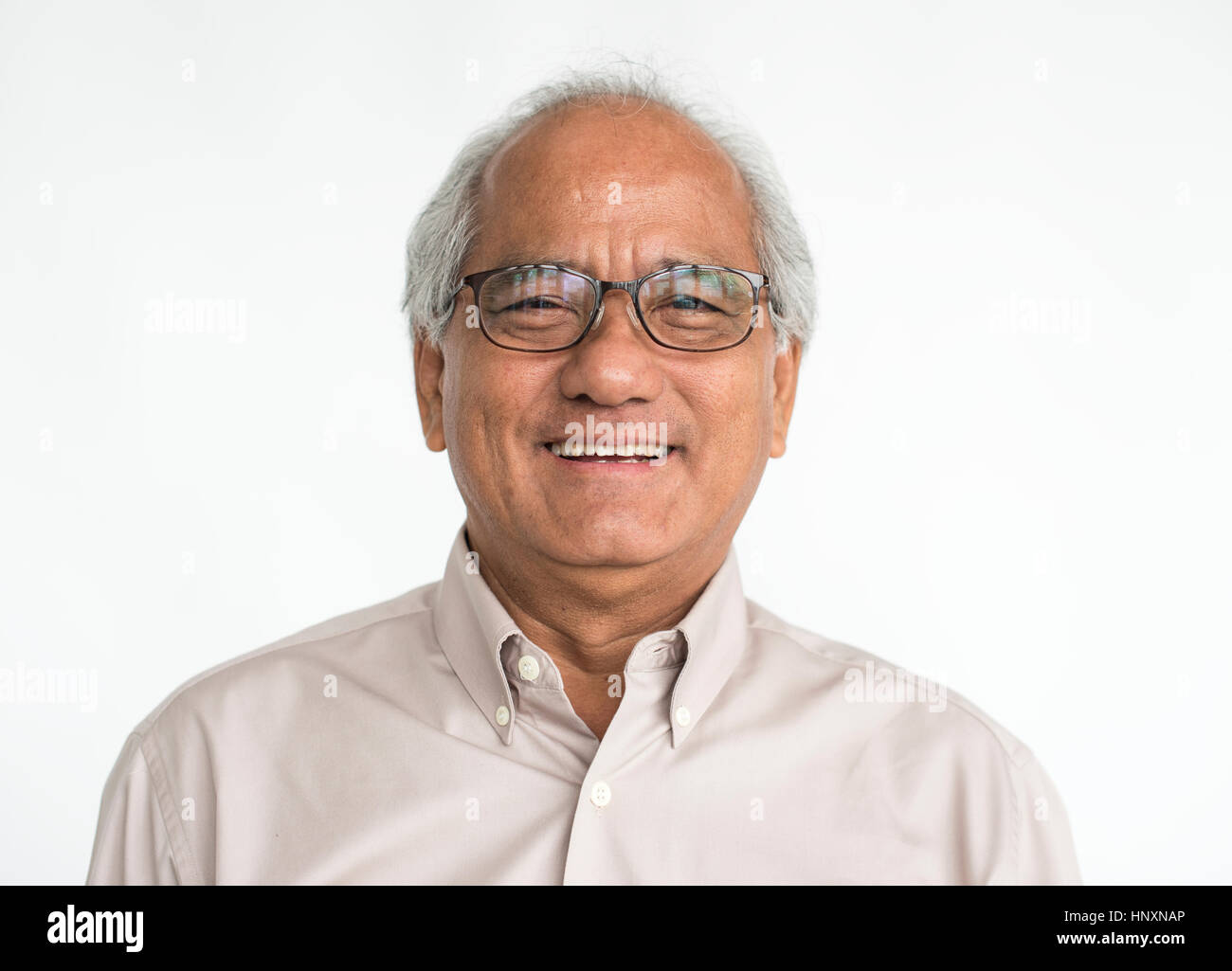 Mature guy wearing glasses studio portrait Stock Photo - Alamy