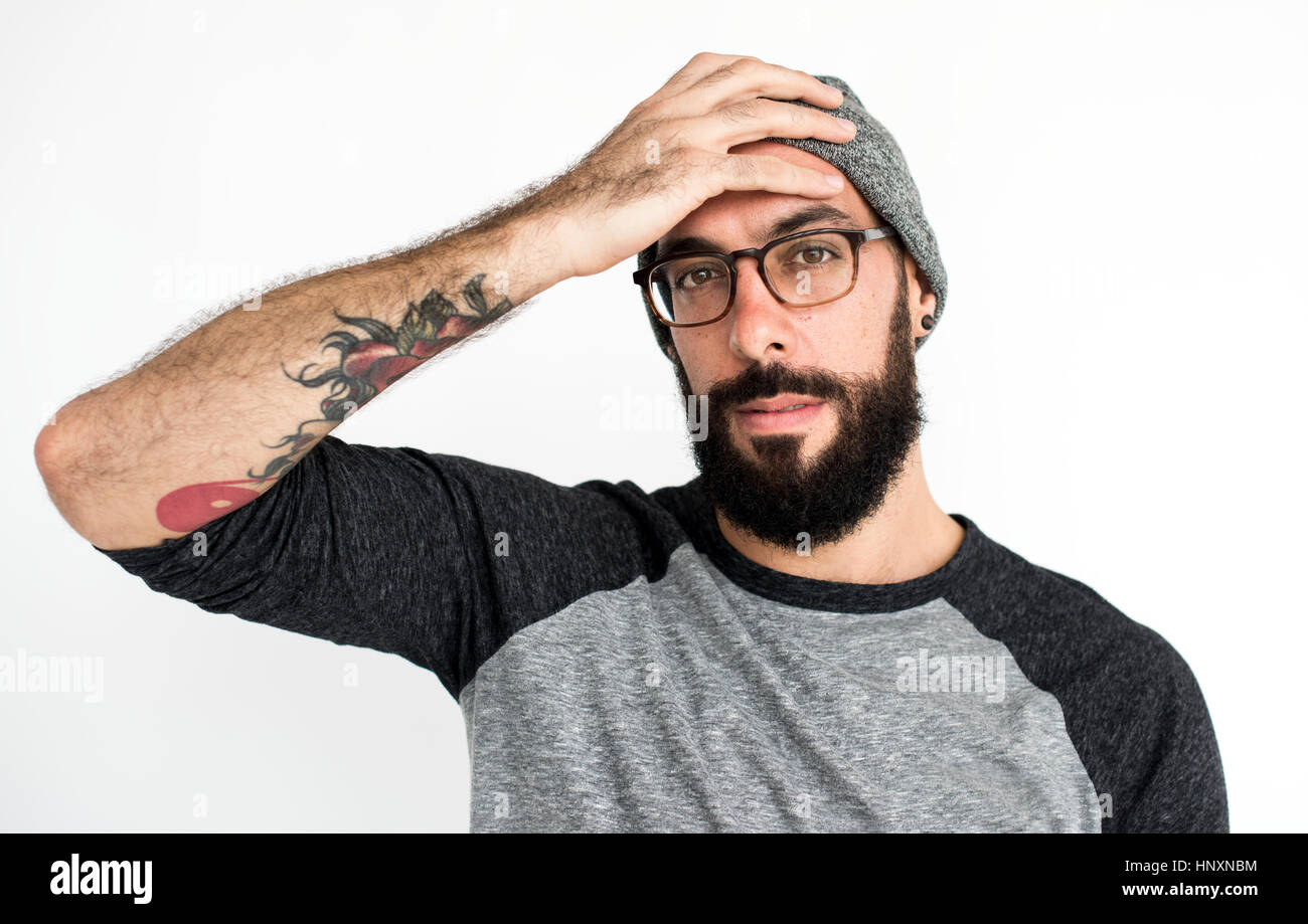 Guy touching head serious gesture Stock Photo - Alamy