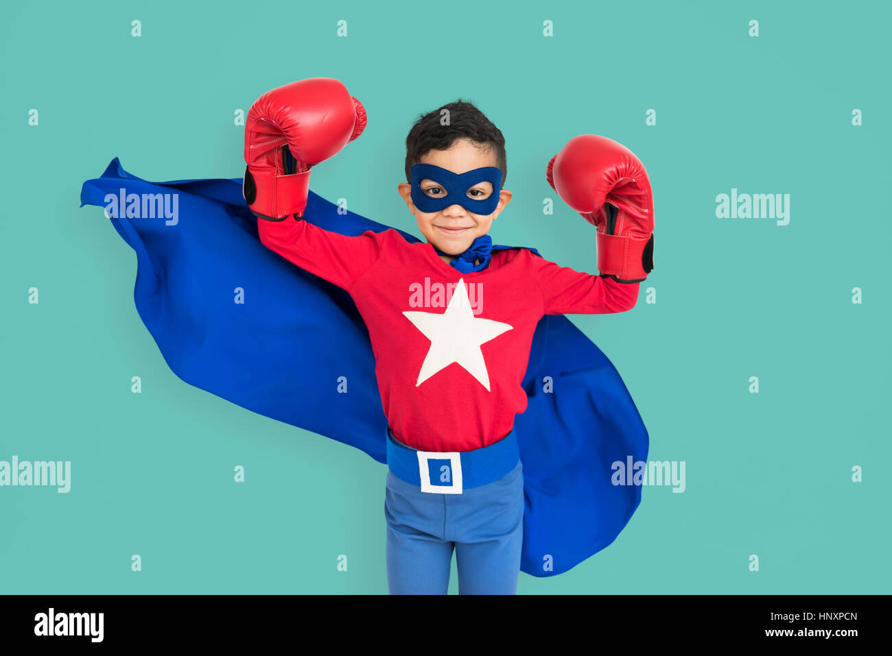 Superhero Kid Mighty Strength Concept Stock Photo - Alamy