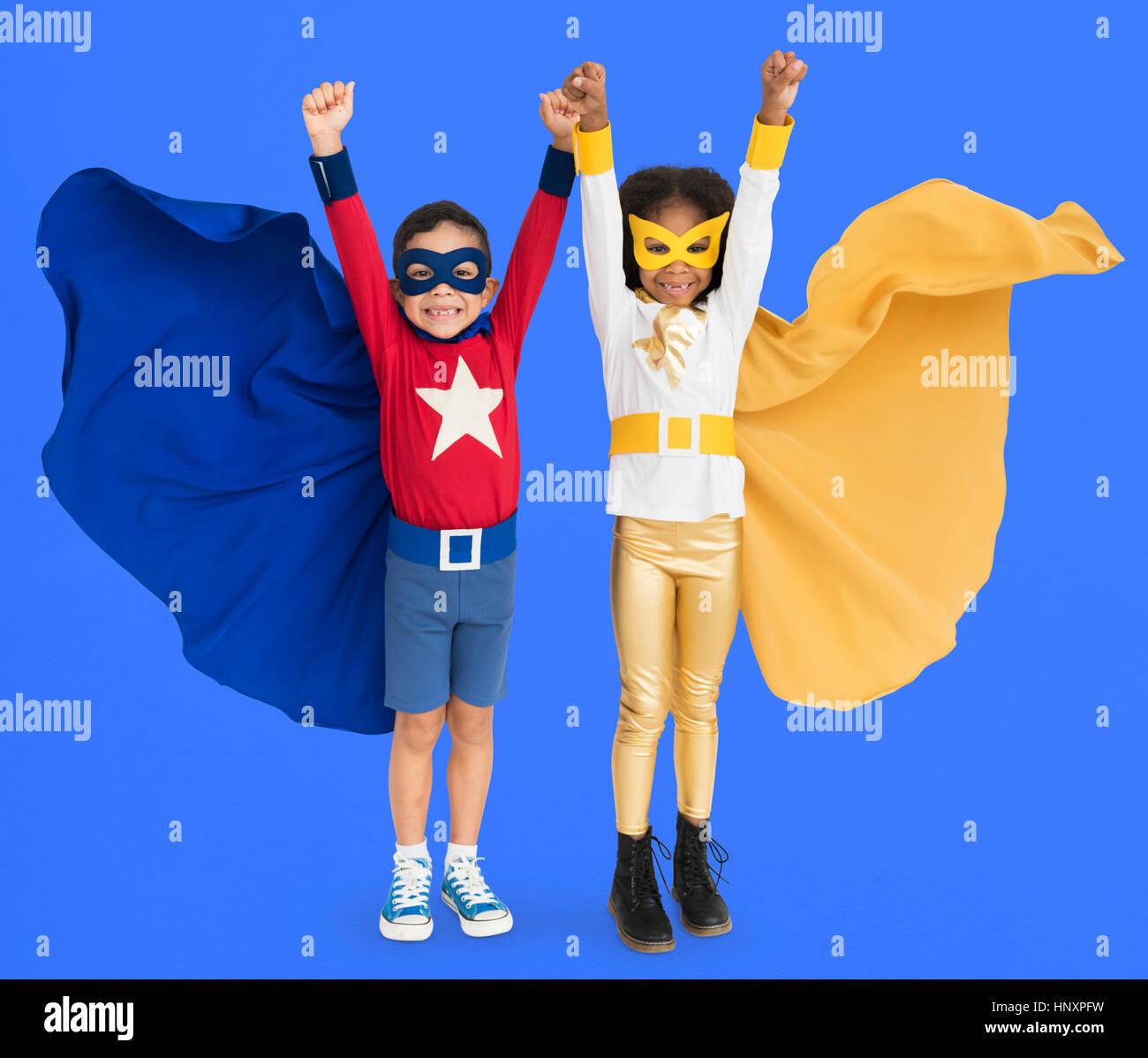 Superhero Kids Hands Up Concept Stock Photo - Alamy