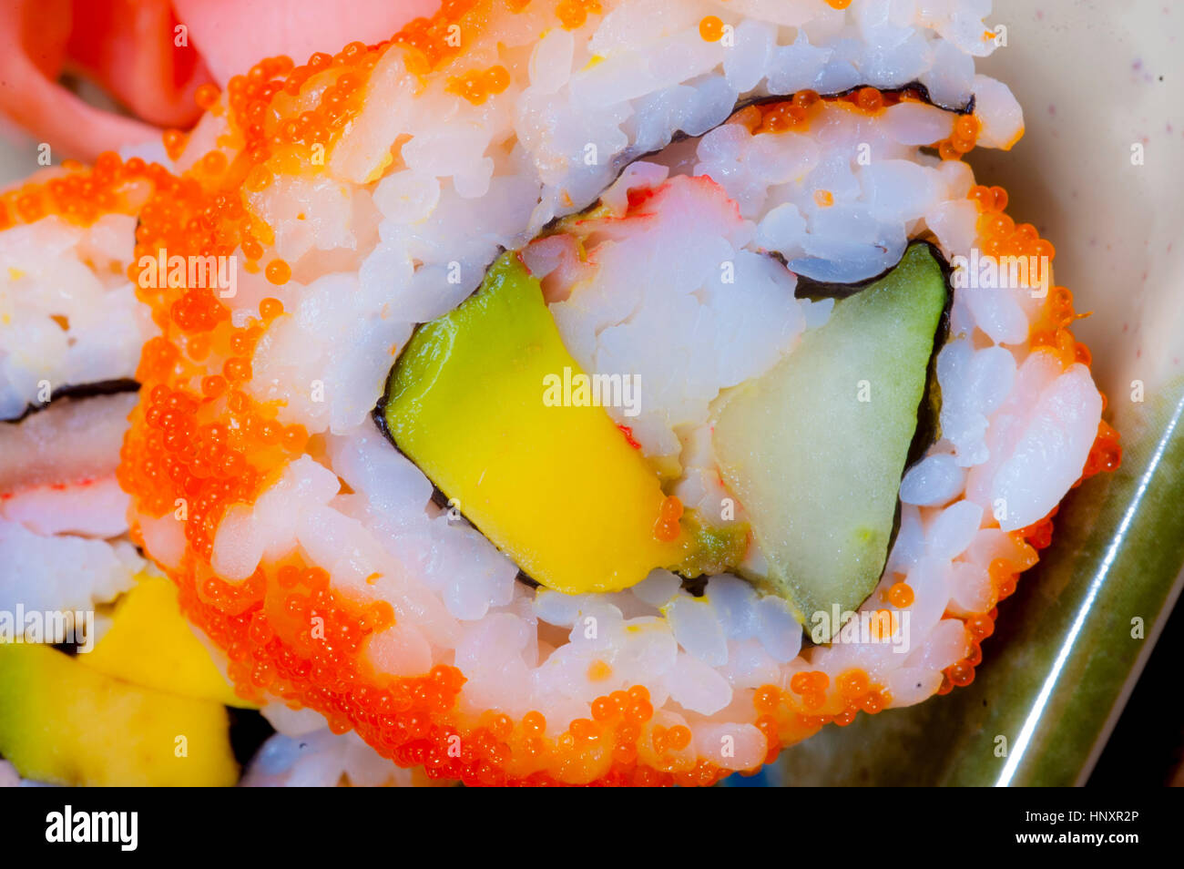 closu up of sushi roll with orange roe Stock Photo - Alamy