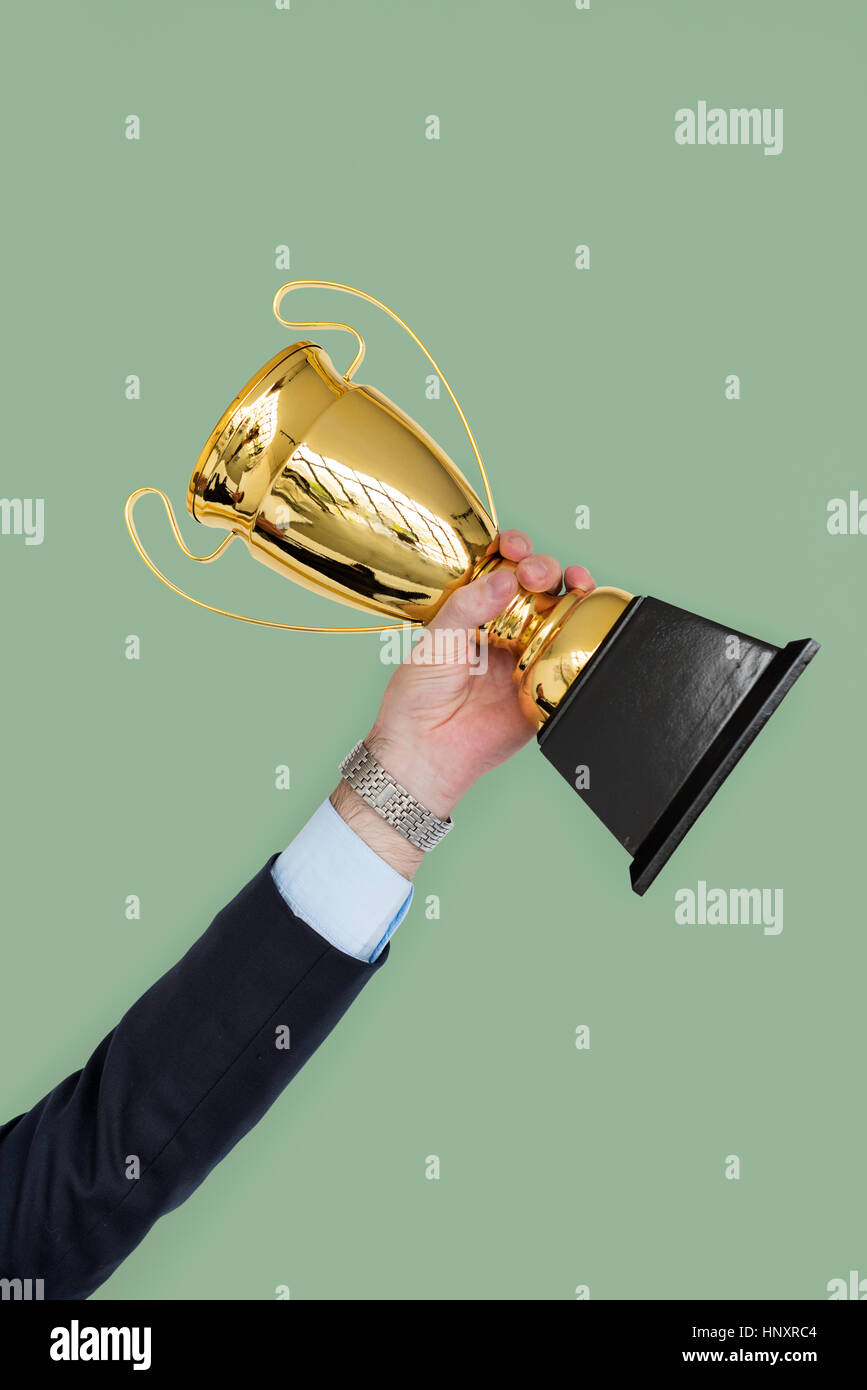 Man holding trophy hi-res stock photography and images - Alamy