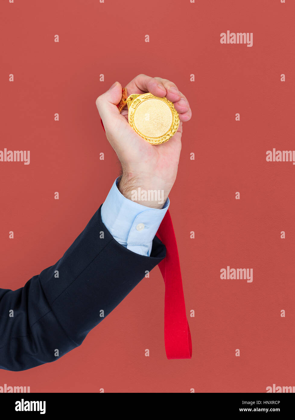 Business Man Holding Trophy Stock Photo - Alamy