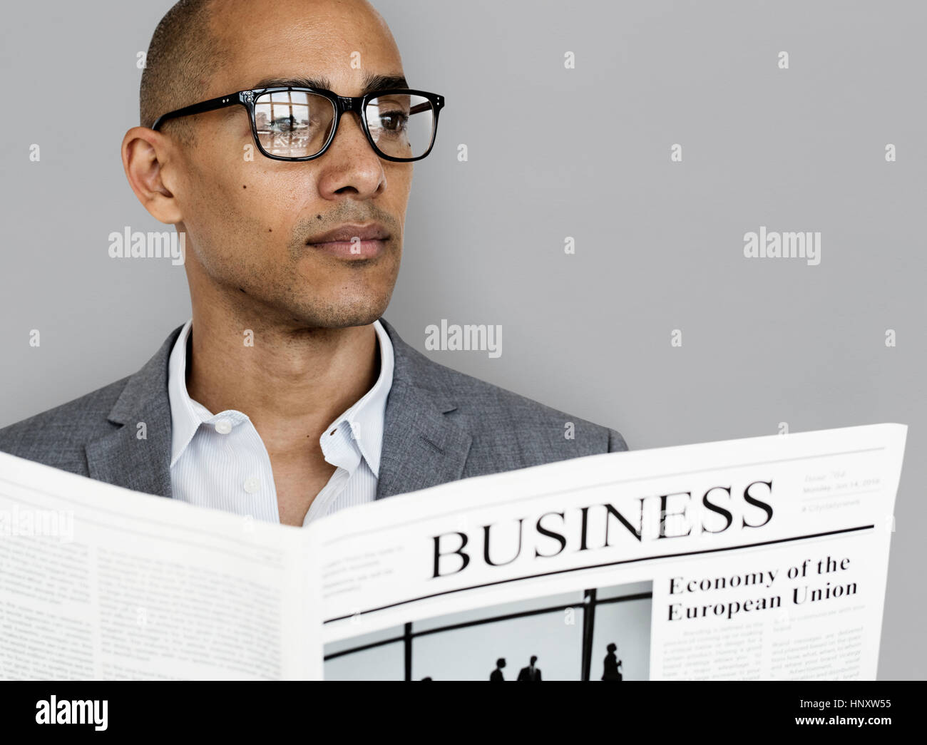 African Descent Business Man Newspaper Concept Stock Photo - Alamy