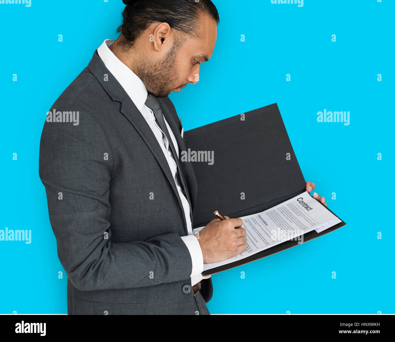 Indian Asian Man Signing Contract Stock Photo - Alamy