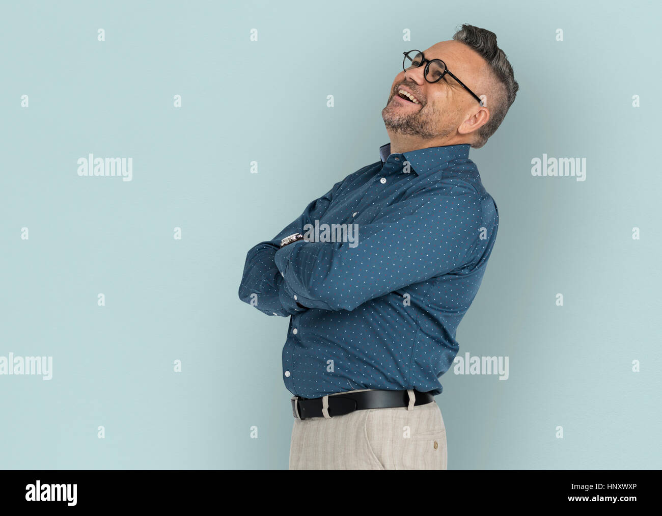Man folding arms hi-res stock photography and images - Alamy