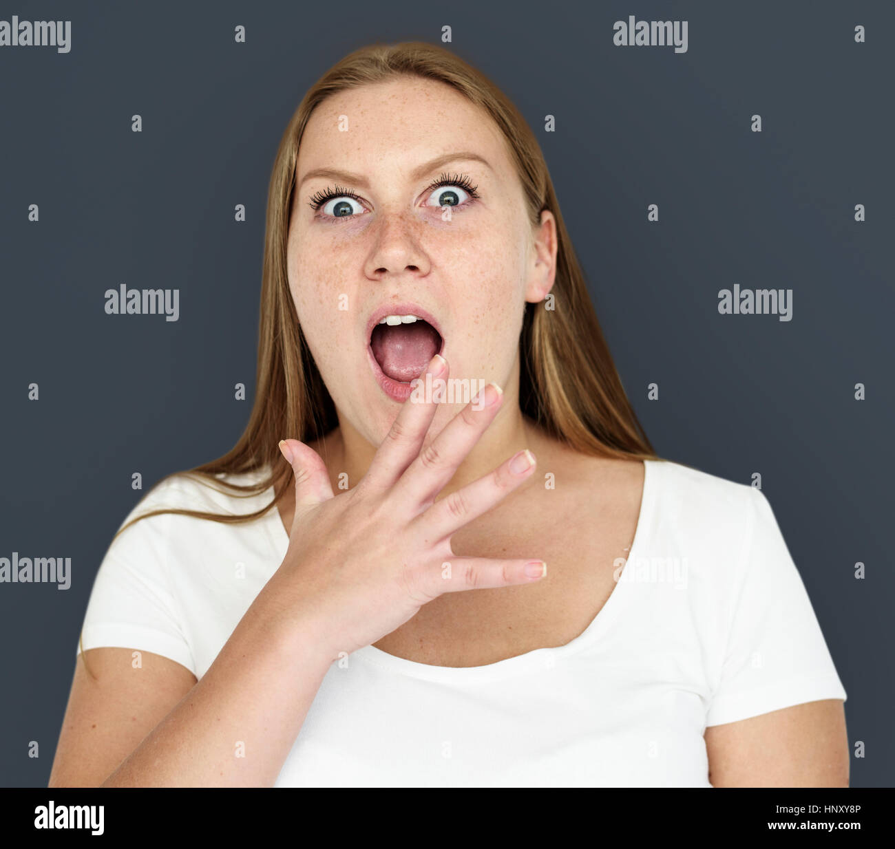 Caucasian Girl Shocked Hand Gesture Stock Photo - Alamy
