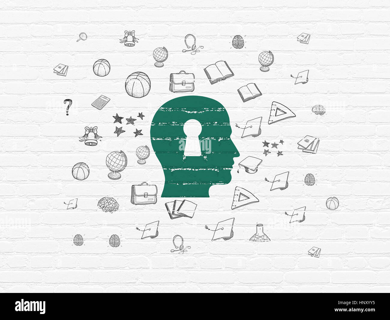 Education concept: Head With Keyhole on wall background Stock Photo - Alamy