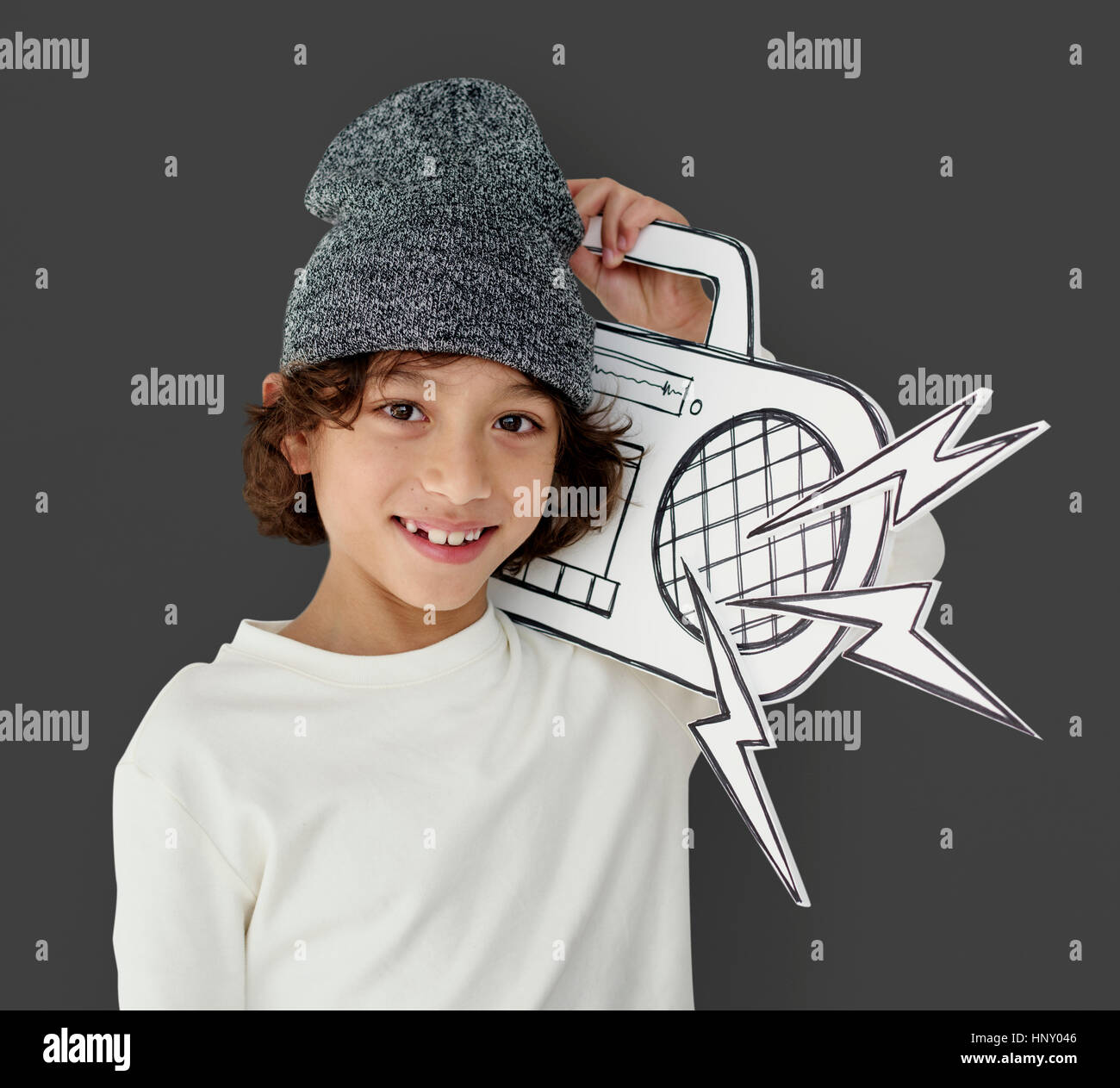 Little Boy Holding Jukebox Smiling Papercraft Stock Photo - Alamy