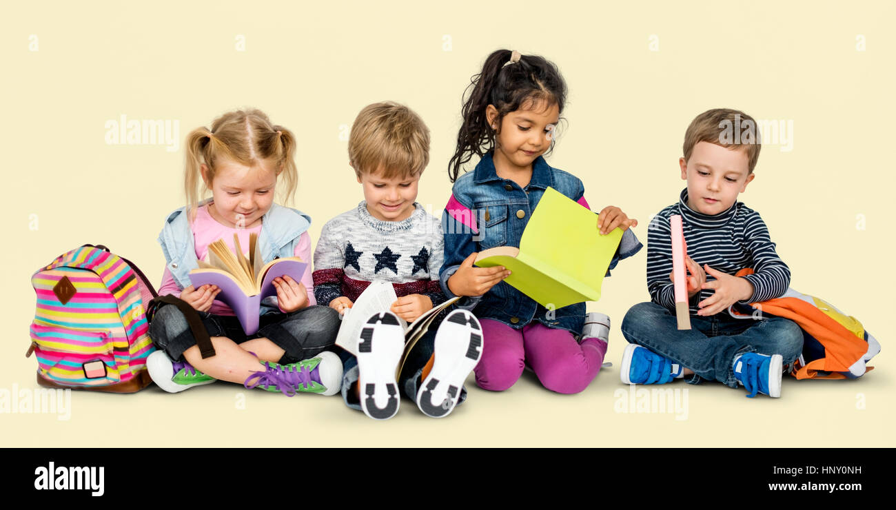 Little Kids Reading Book Cheerful Stock Photo - Alamy