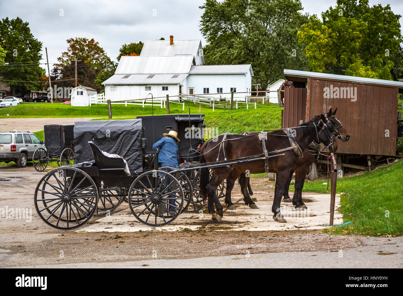 Amish horse and buggies at a hitching post in Dalton, Ohio, USA Stock ...