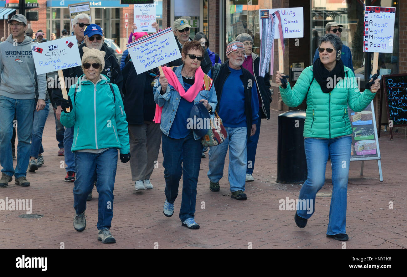 Marchers during protest of president Trump's policies in Boulder ...