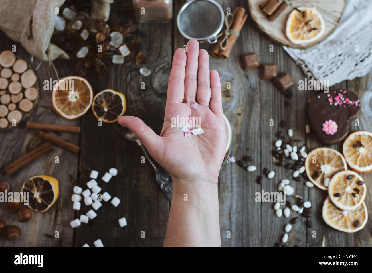 Female hand holding piece chocolate hi-res stock photography and images ...